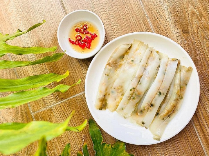 The making of “banh goi”, a kind of rice dumpling wrapped in banana ...